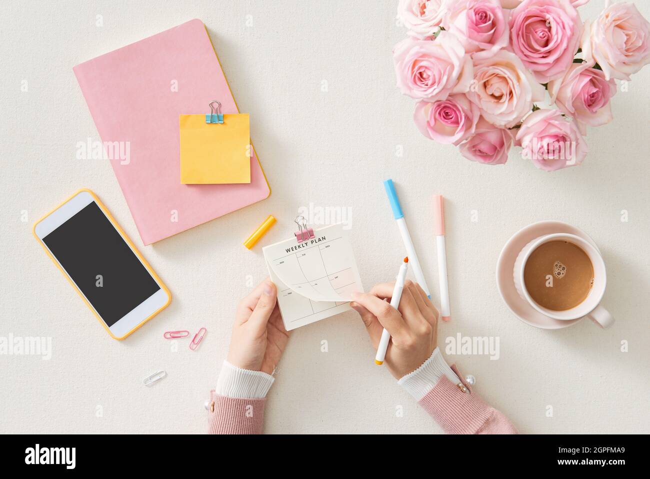 Female workspace with computer, roses flowers bouquet Stock Photo - Alamy