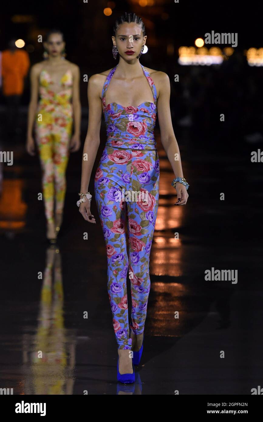 Model Binx Walton walks on the runway at the Saint Laurent fashion show ...