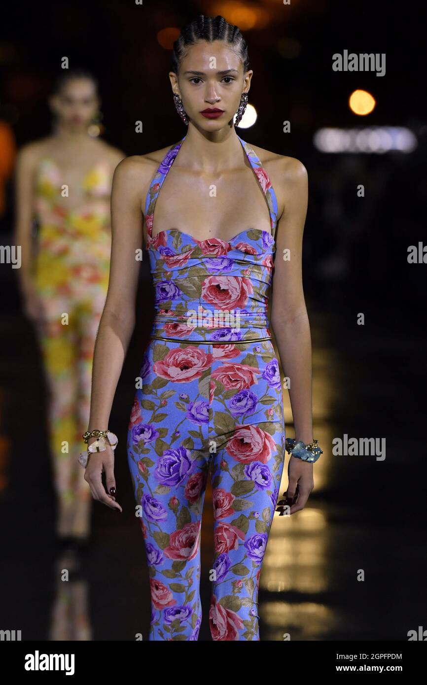Model Binx Walton walks on the runway at the Saint Laurent fashion show ...