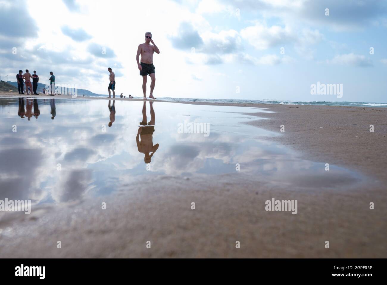 Sariyer, Istanbul, Turkey - 07.14.2021: sky reflection on a puddle ...