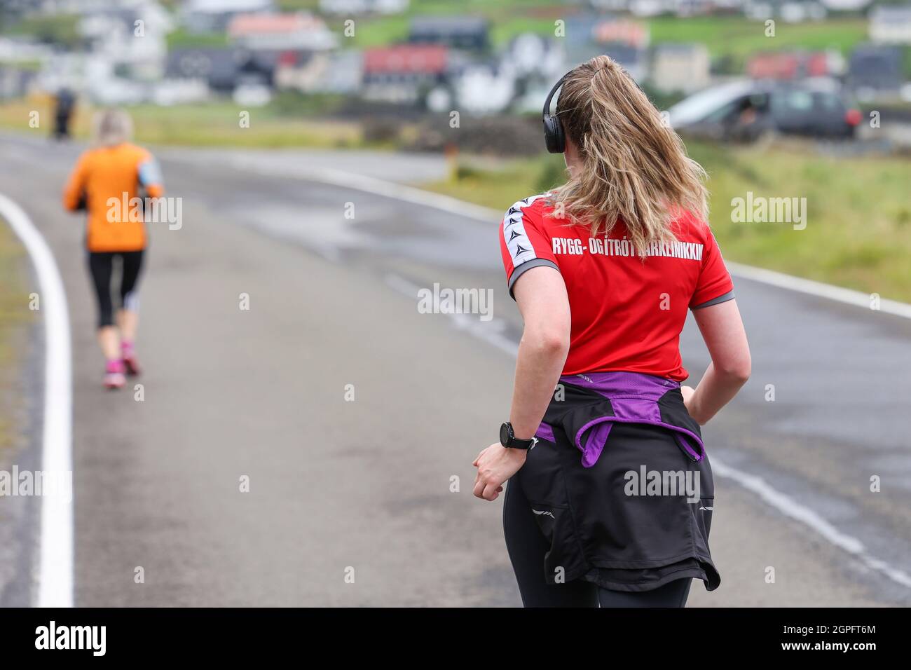 Female runners participating in the half marathon from Gasadalur to ...
