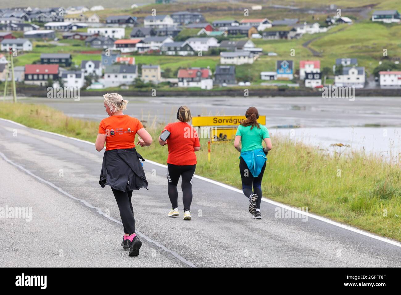 Female runners participating in the half marathon from Gasadalur to ...