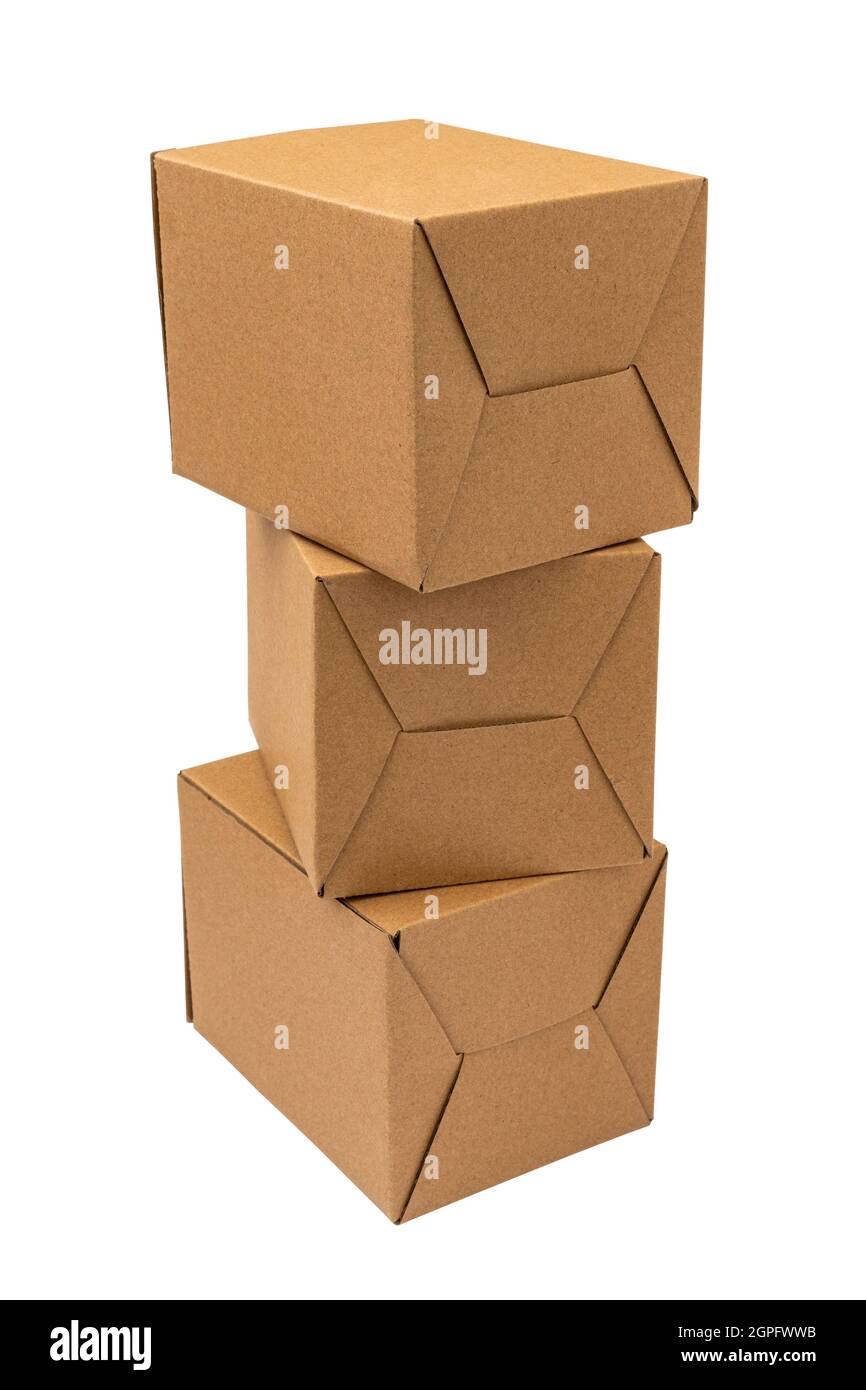 Close up of a stack of cardboard boxes isolated on white background ...