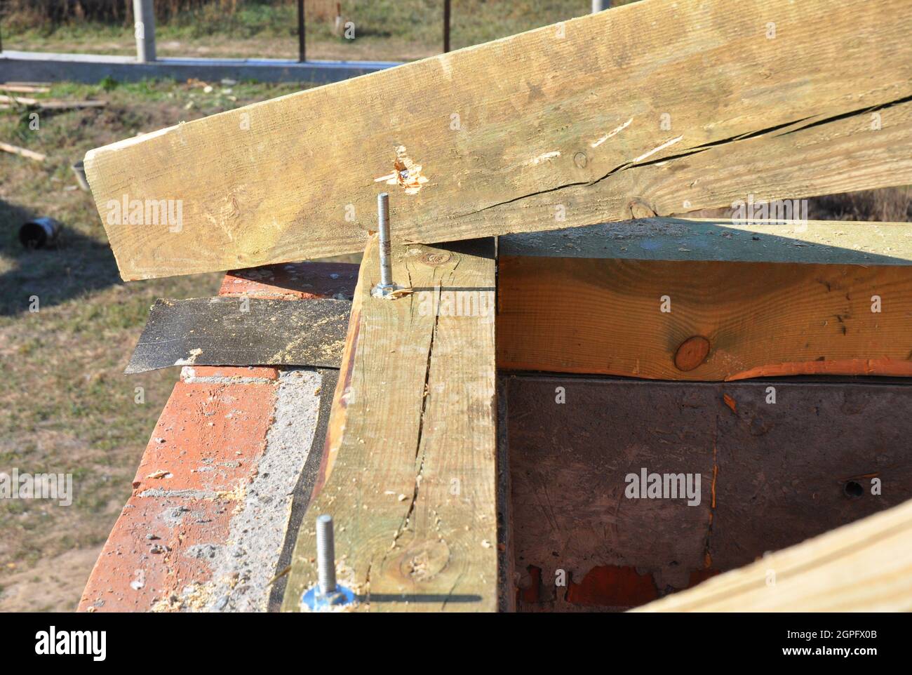 Roofing construction. Installing wooden rafters, frame timber with ...