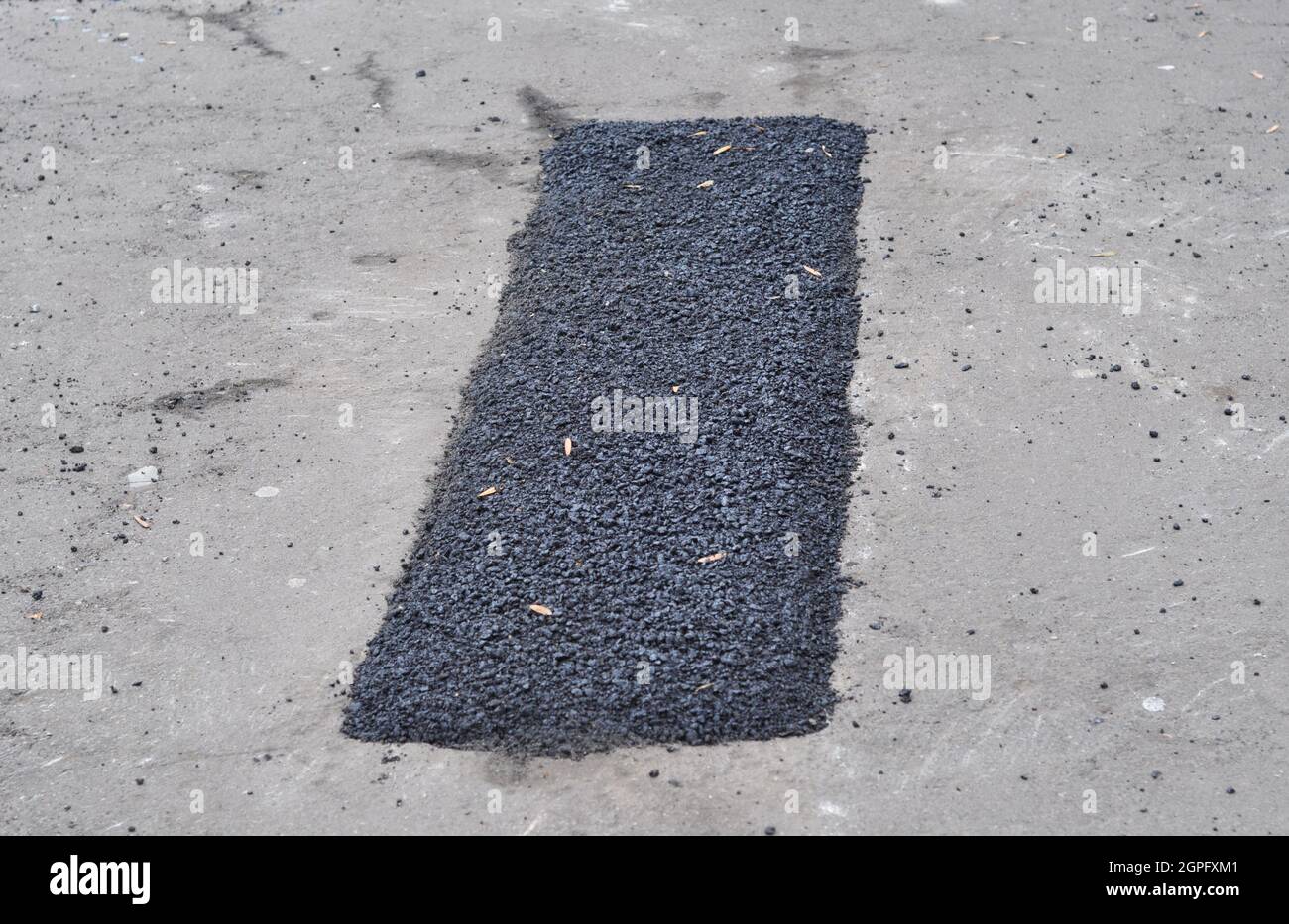 Repair pavement and laying new asphalt patching method outdoors. Road ...