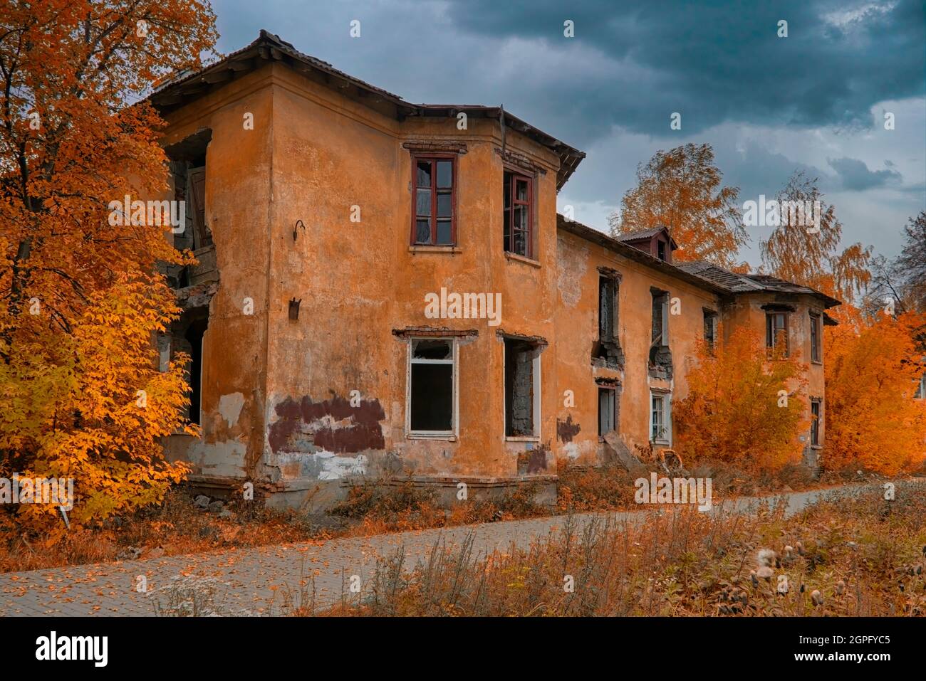 The ruins of a destroyed building in the city. Old abandoned collapsing ...