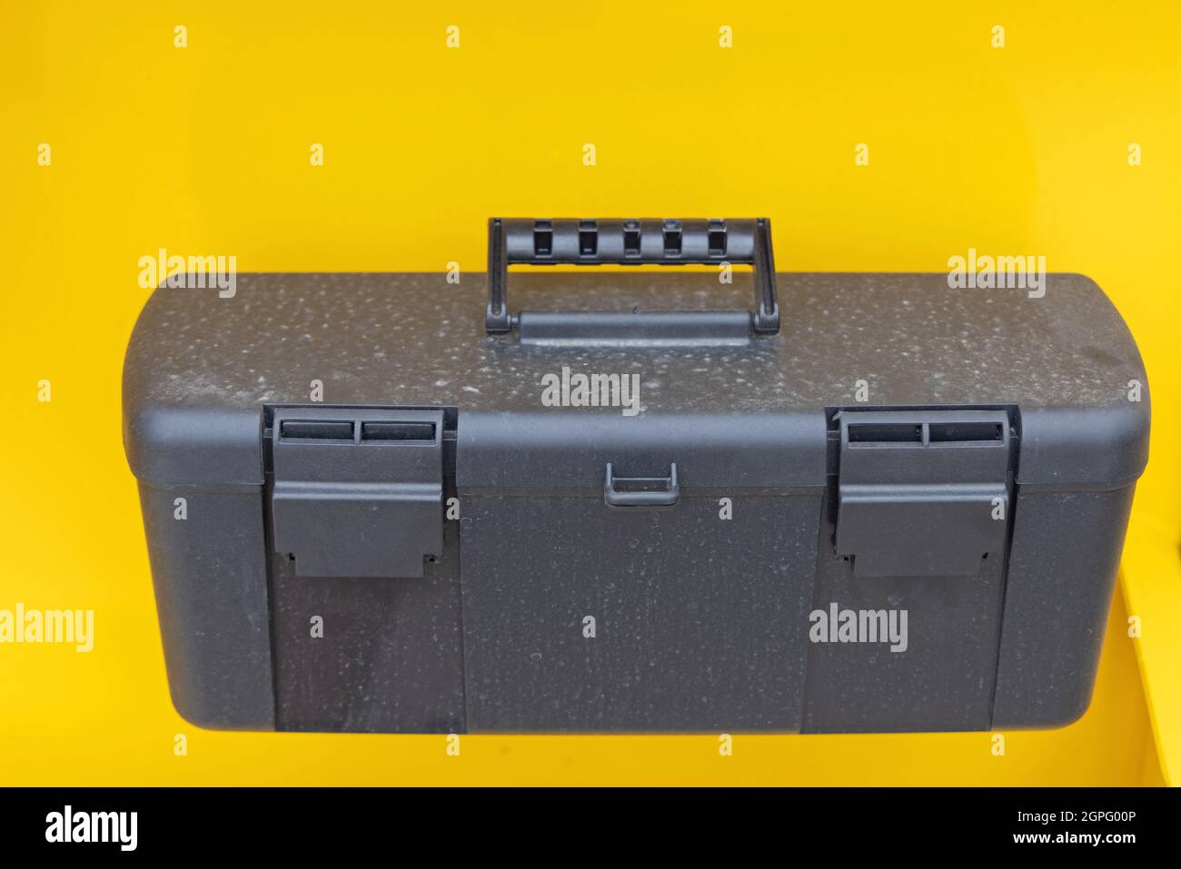 Plastic Toolbox Attach to Yellow Construction Machine Stock Photo - Alamy