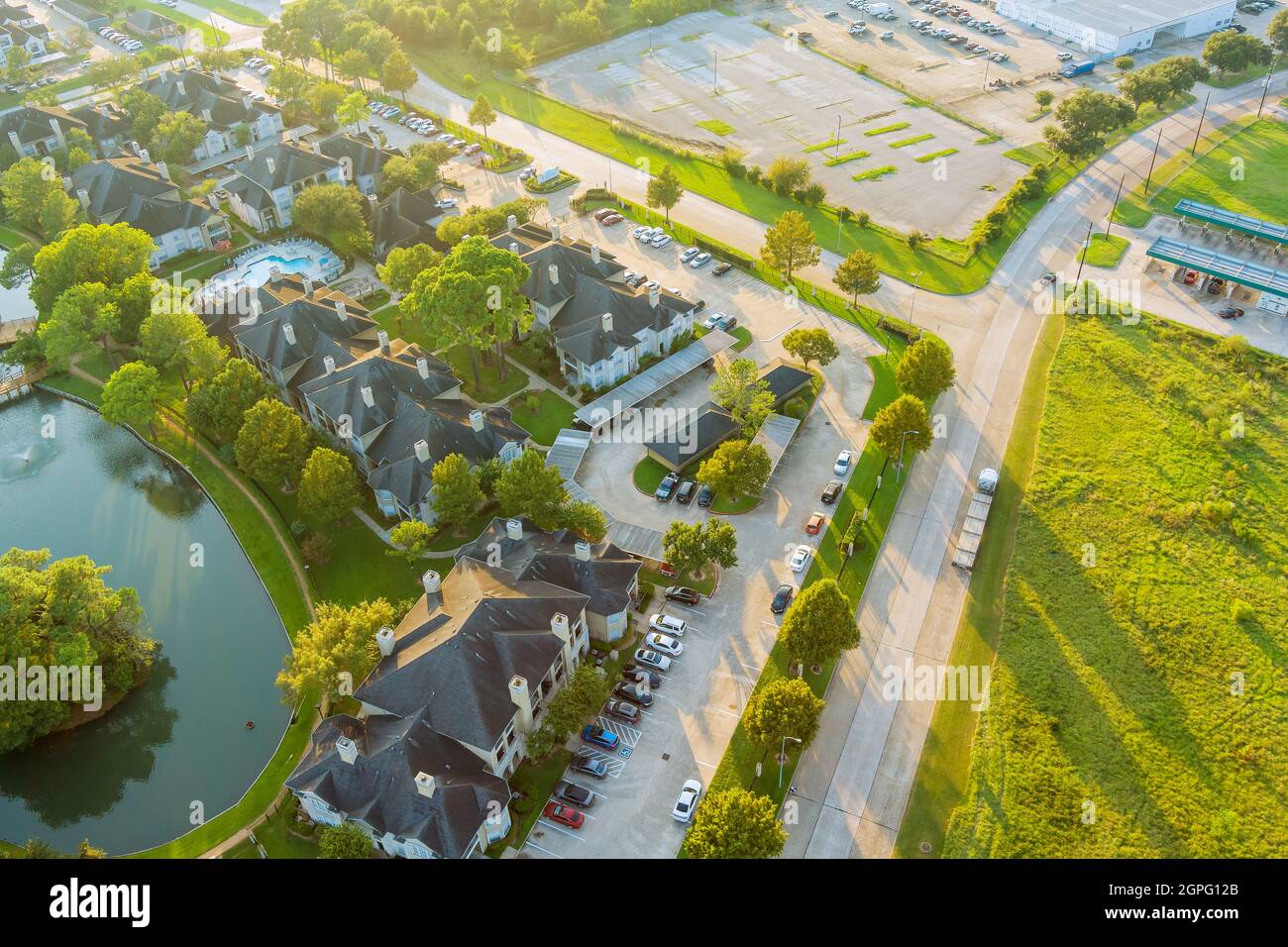 Aerial view of residential houses and driveways neighborhood during a ...