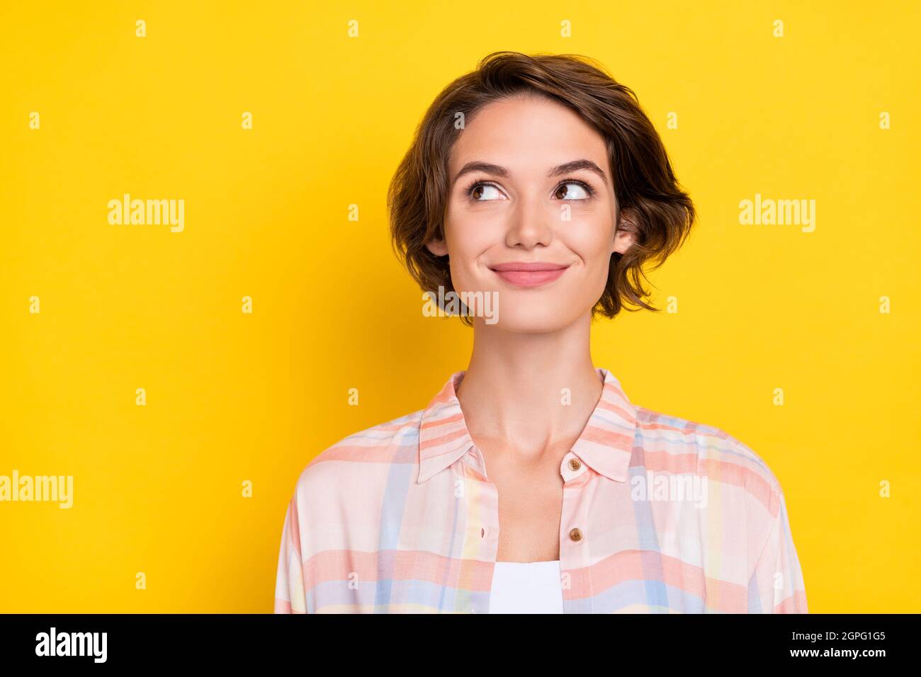 Photo of dreamy nice happy young woman smile look empty space imagine ...
