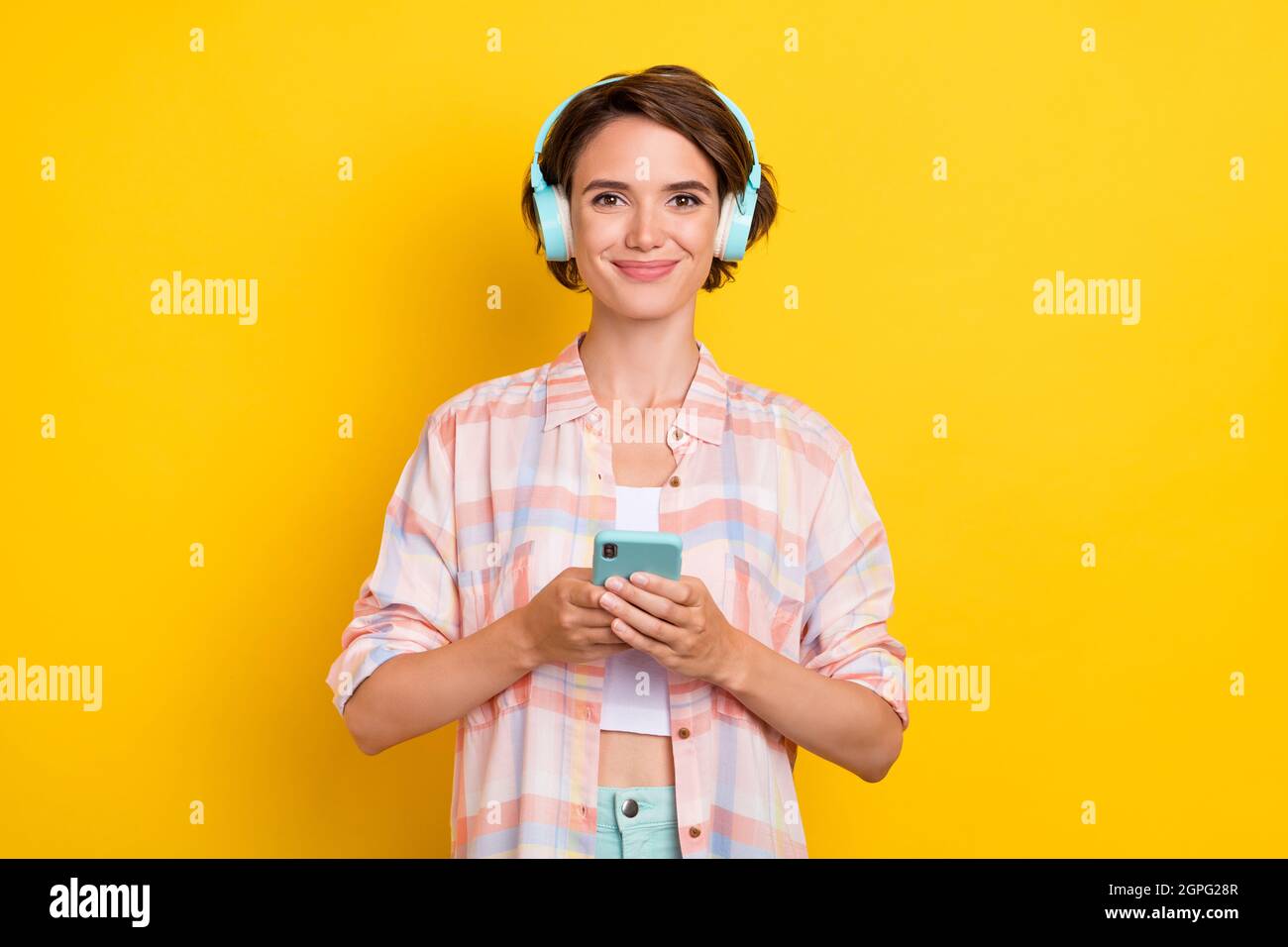 Portrait of attractive cheerful girl listening song sound hit using ...