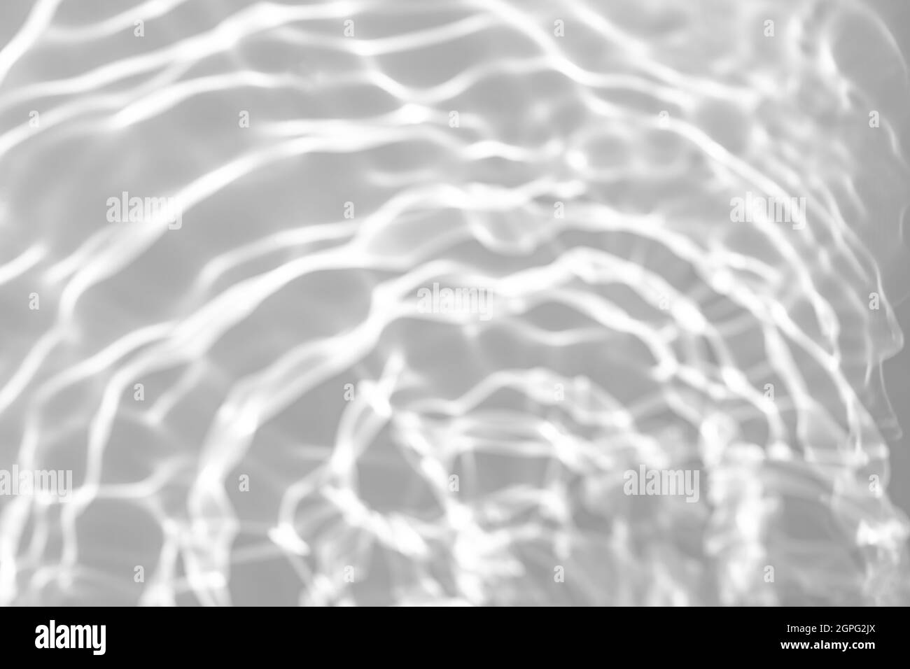 blurred shadow and light caustic effect on a white wall Stock Photo - Alamy