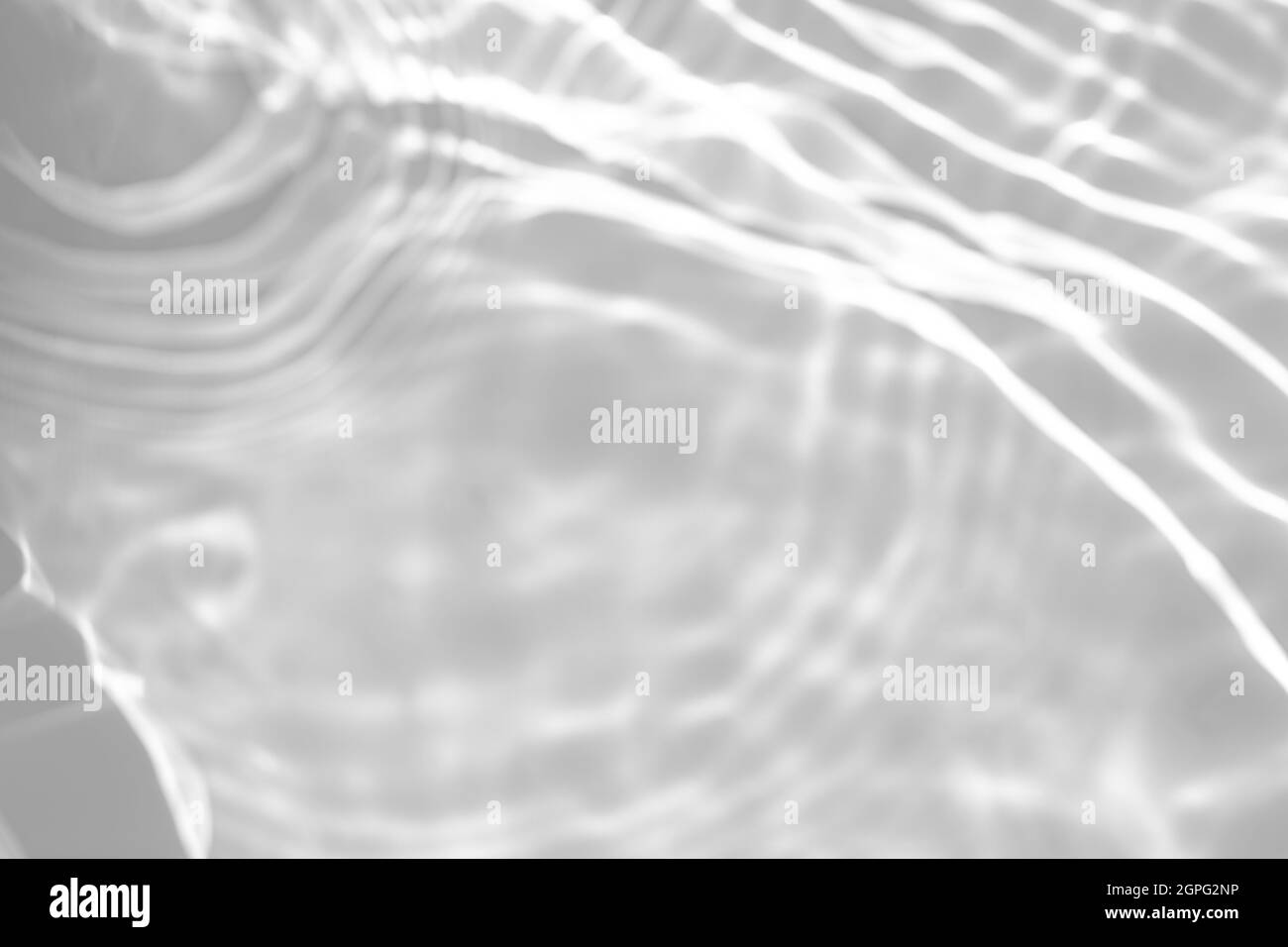 blurred shadow and light caustic effect on a white wall Stock Photo - Alamy