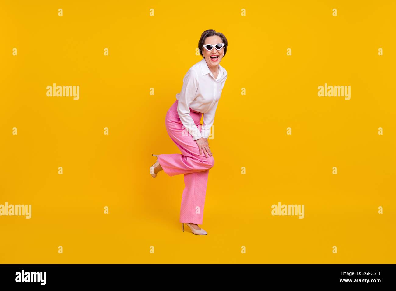 Full length photo of aged excited woman happy positive smile have fun ...