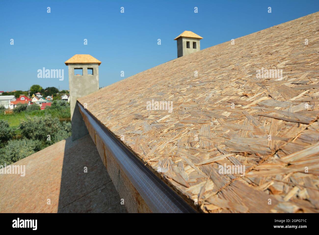 Roofing construction with wooden boards before laying asphalt shingles ...