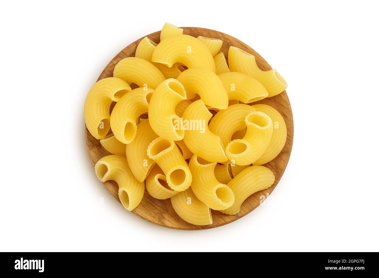 raw macaroni pasta in wooden bowl isolated on white background with ...