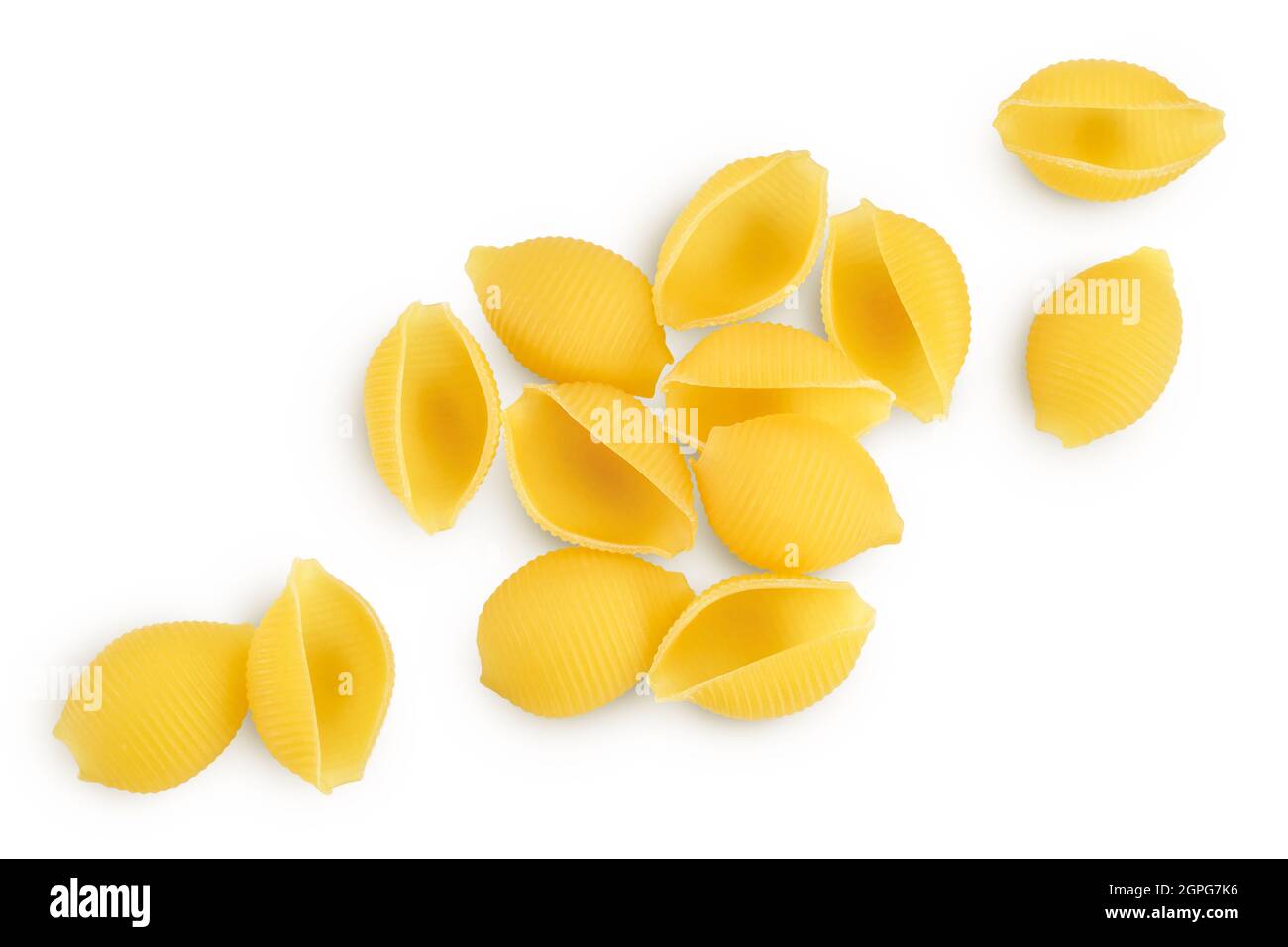 Uncooked dried conchiglie. Raw organic shell pasta isolated on white ...