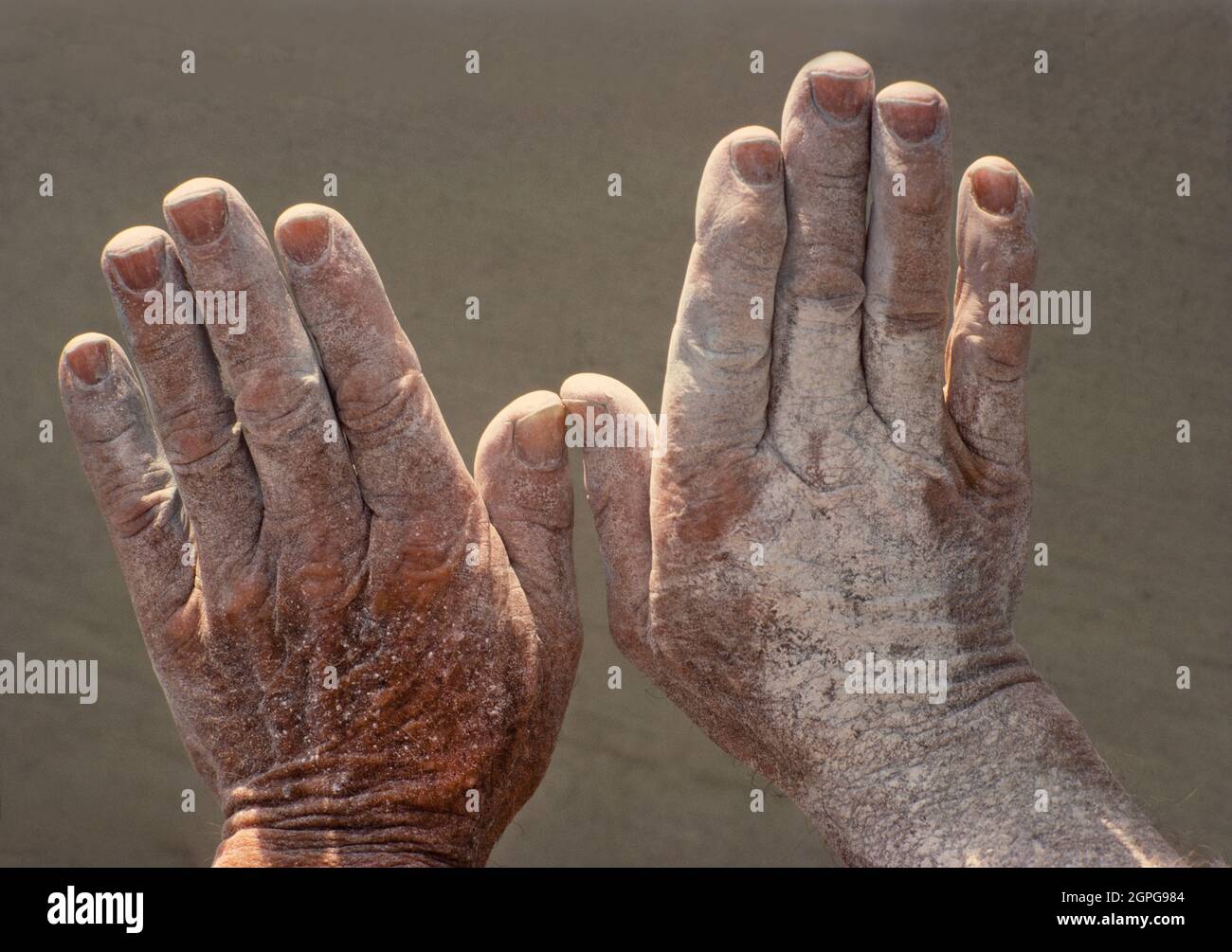 hands with white paint Stock Photo - Alamy