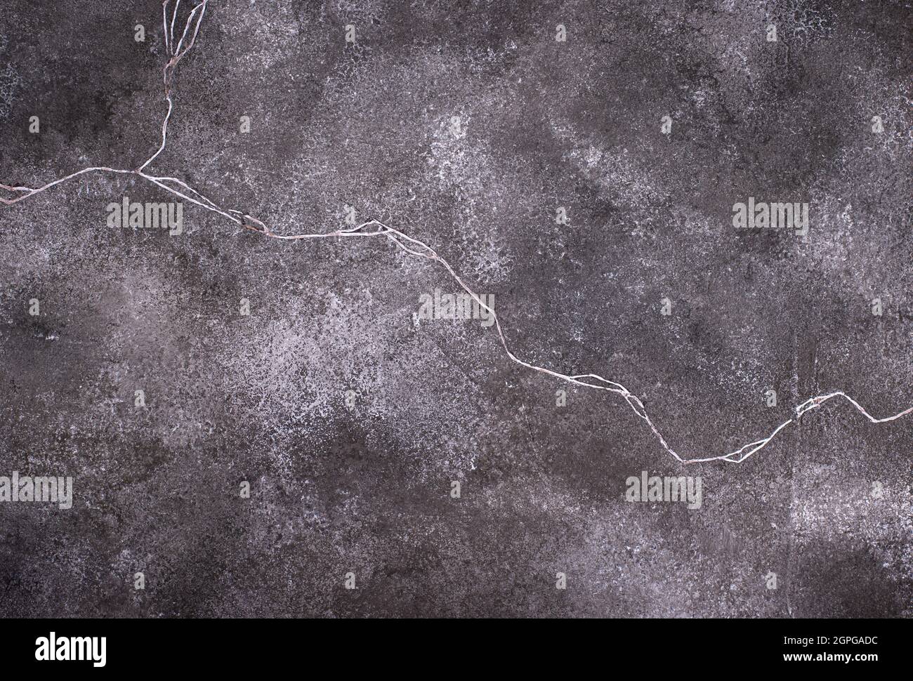 Dark abstract concrete crackle background Stock Photo - Alamy