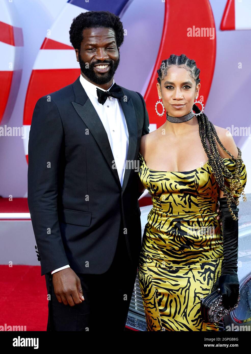 Sope Dirisu and Dominique Tipper attending the World Premiere of No Time To Die, at the Royal ...