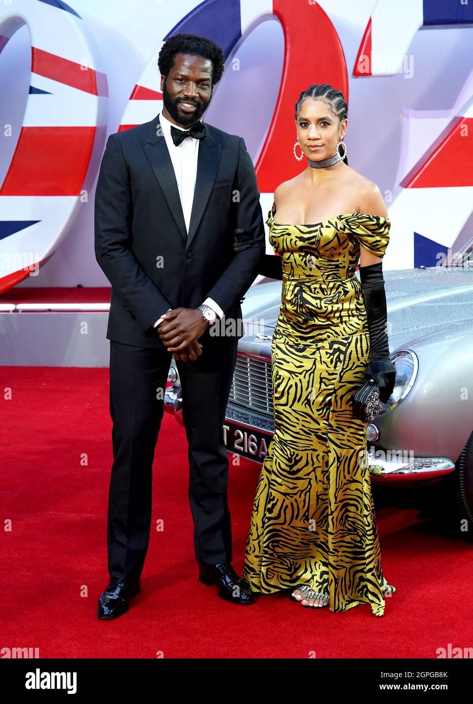 Sope Dirisu and Dominique Tipper attending the World Premiere of No Time To Die, at the Royal ...