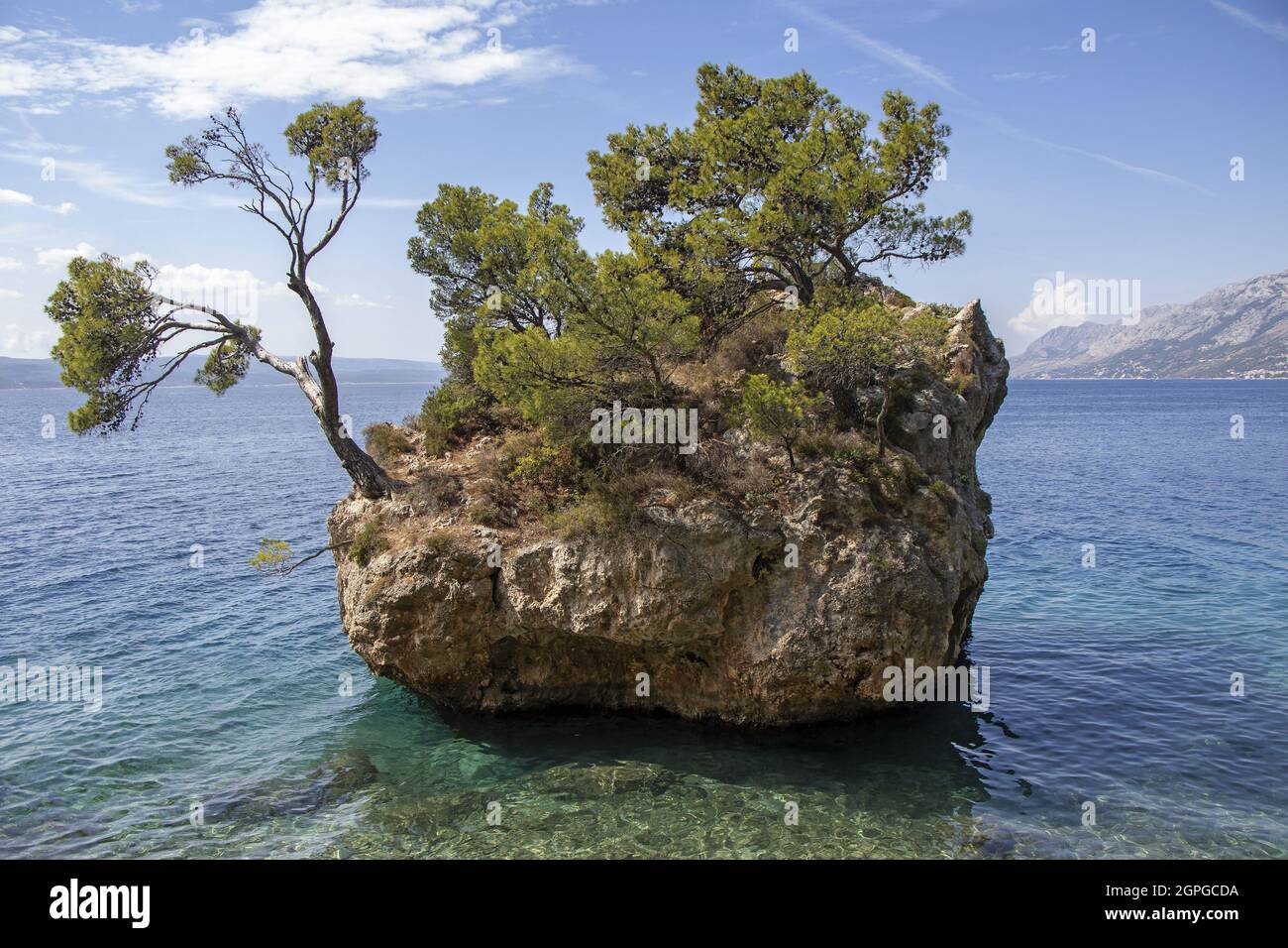 Small stone islet on Punta Rata beach in Brela, Dalmatia, Croatia Stock ...