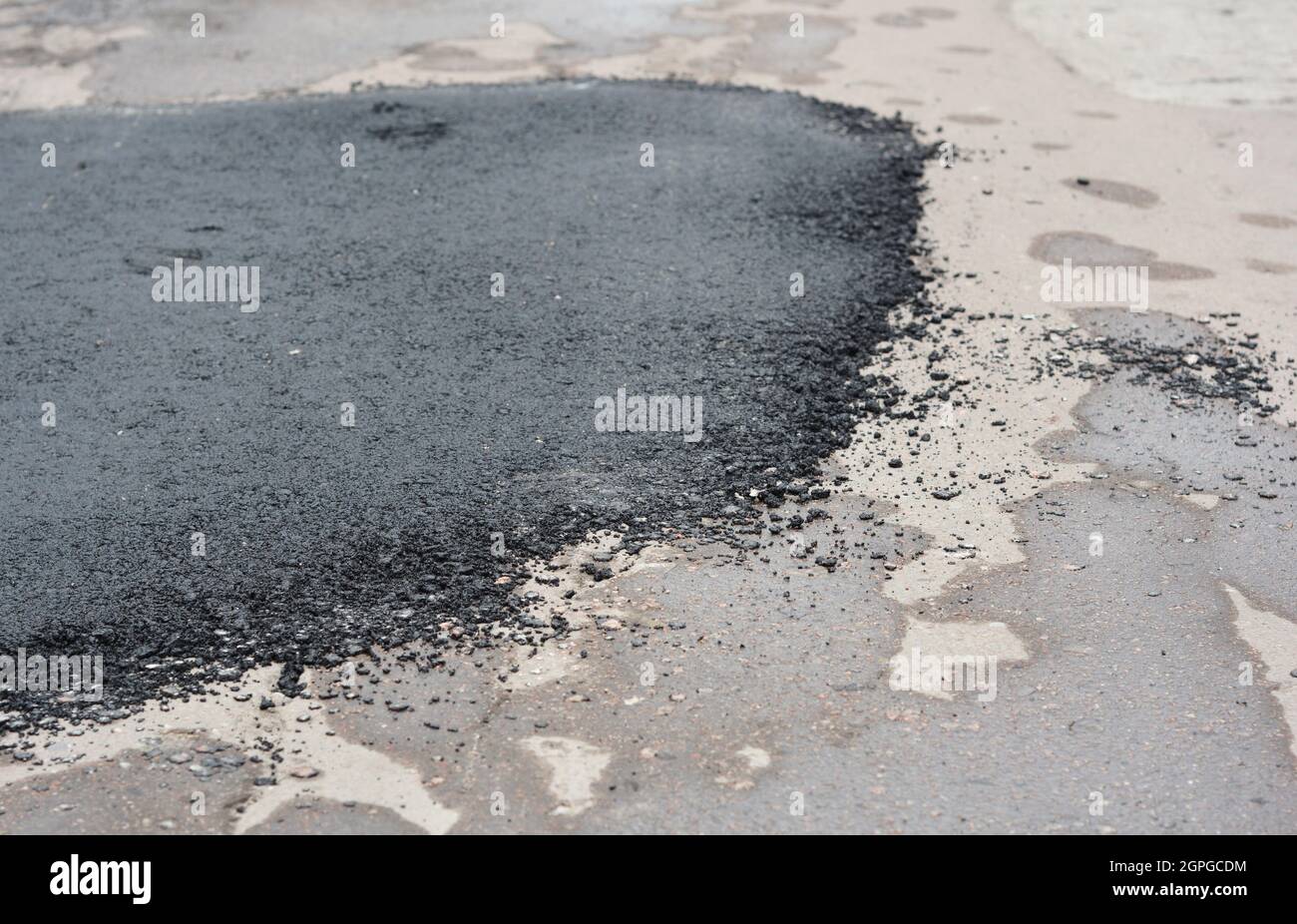 Asphalt road repair. Repair pavement and laying new asphalt patching ...