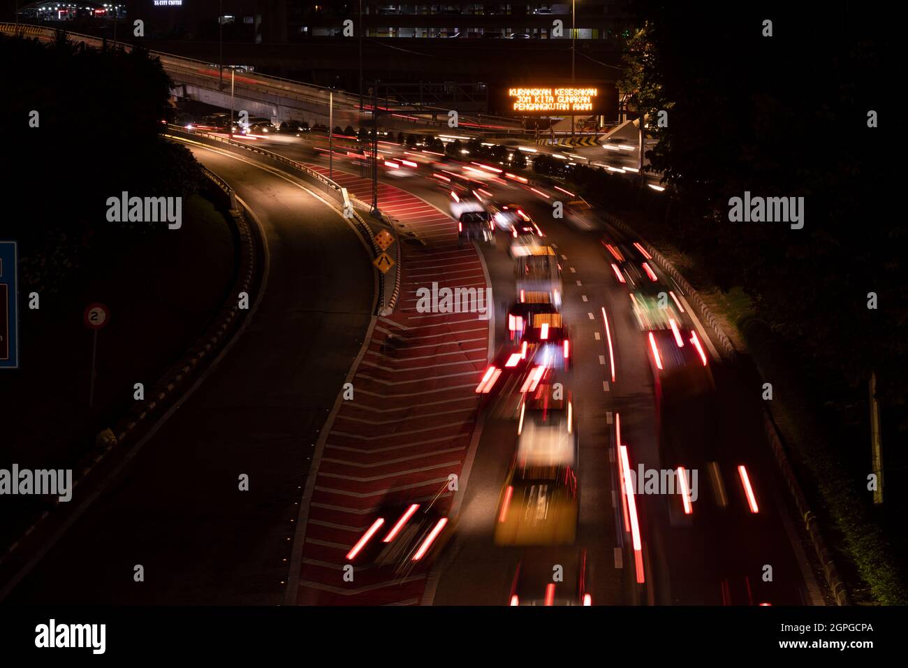 Long exposure photograph of night traffic and traffic jams in the city ...