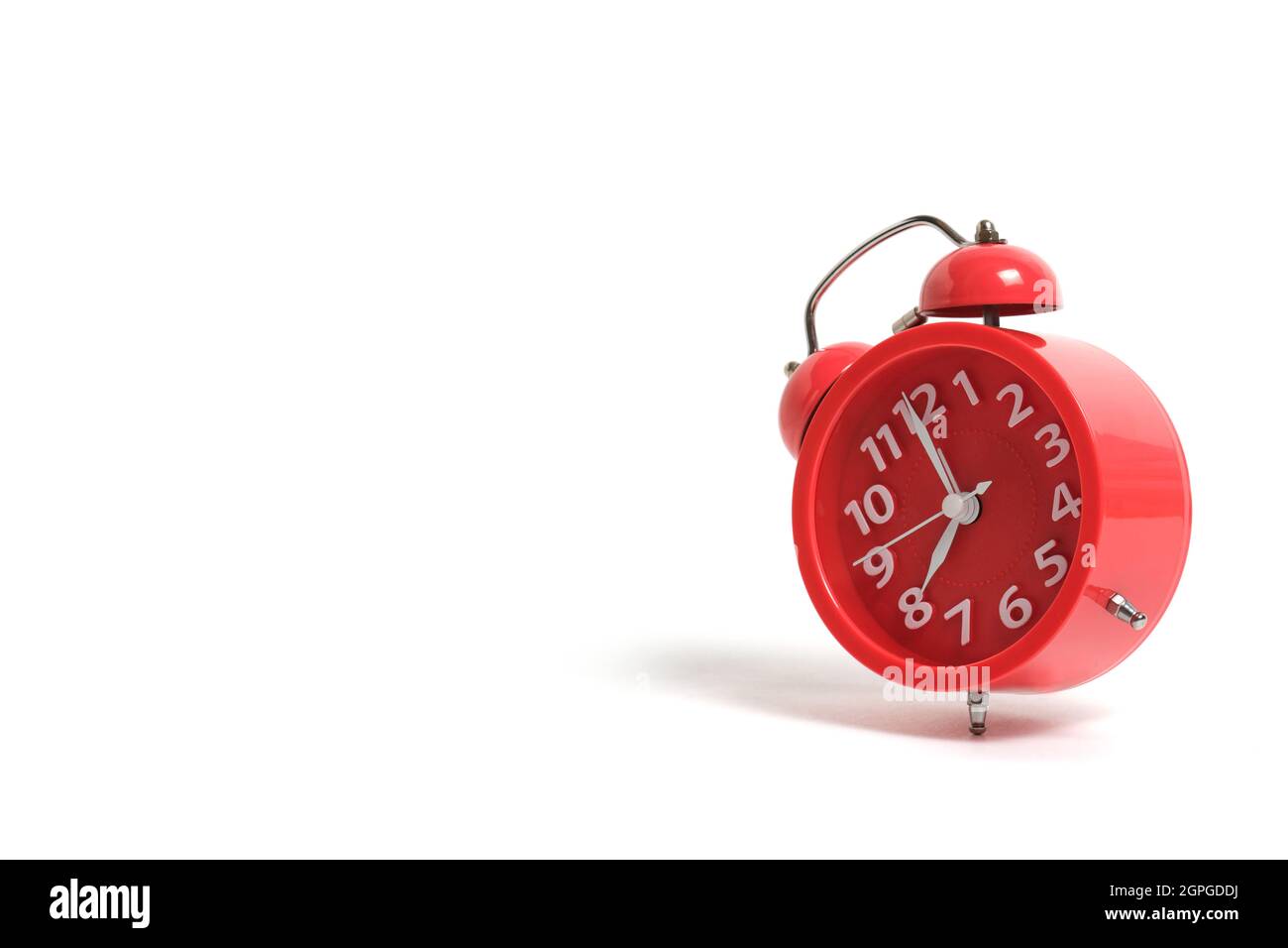 Ringing red alarm clock, isolate on white background, eight morning or ...