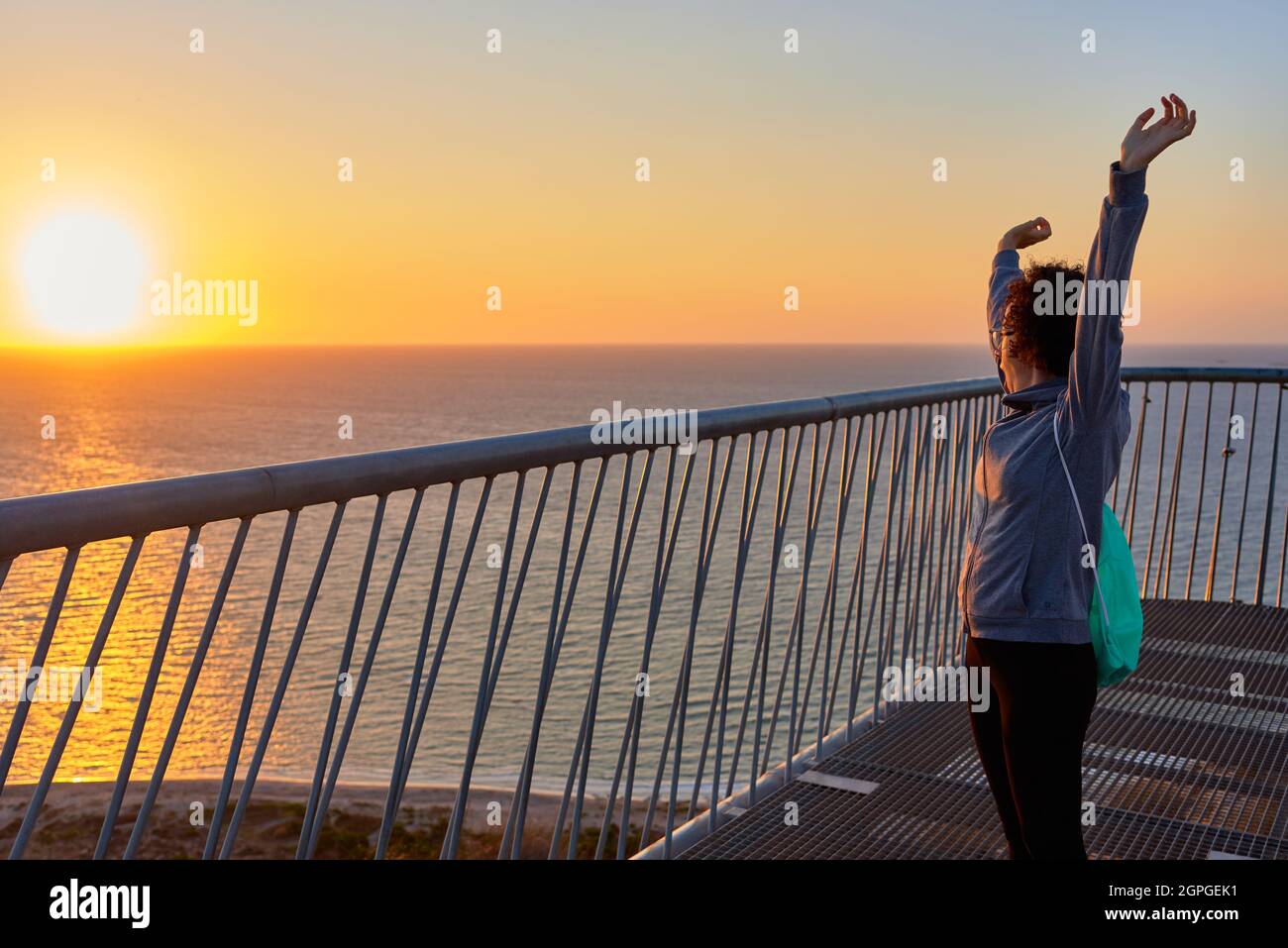 Standing woman stretching yawning hi-res stock photography and images ...