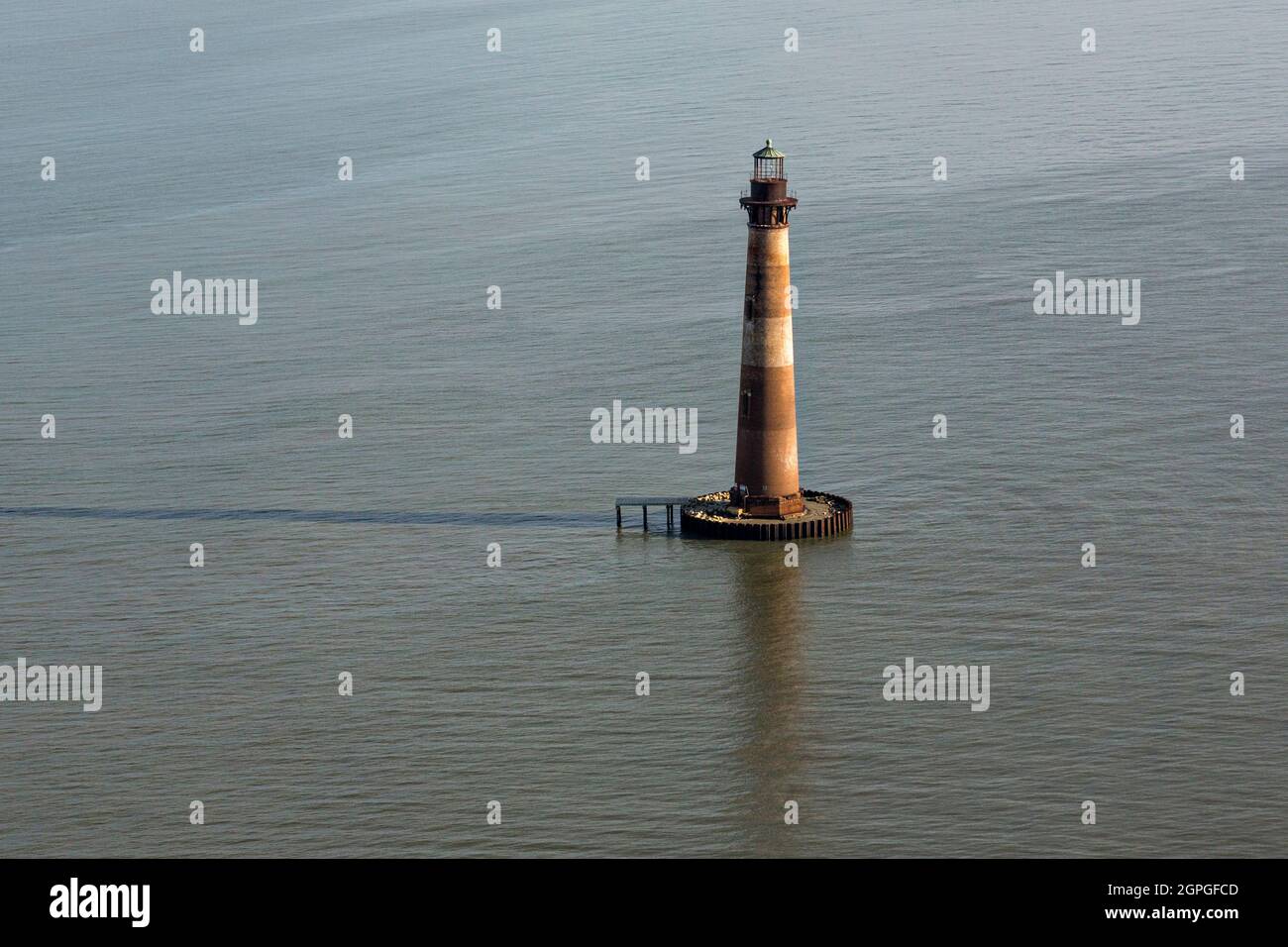 Aerial view of Morris Island Light, a coastal lighthouse built in 1976 ...