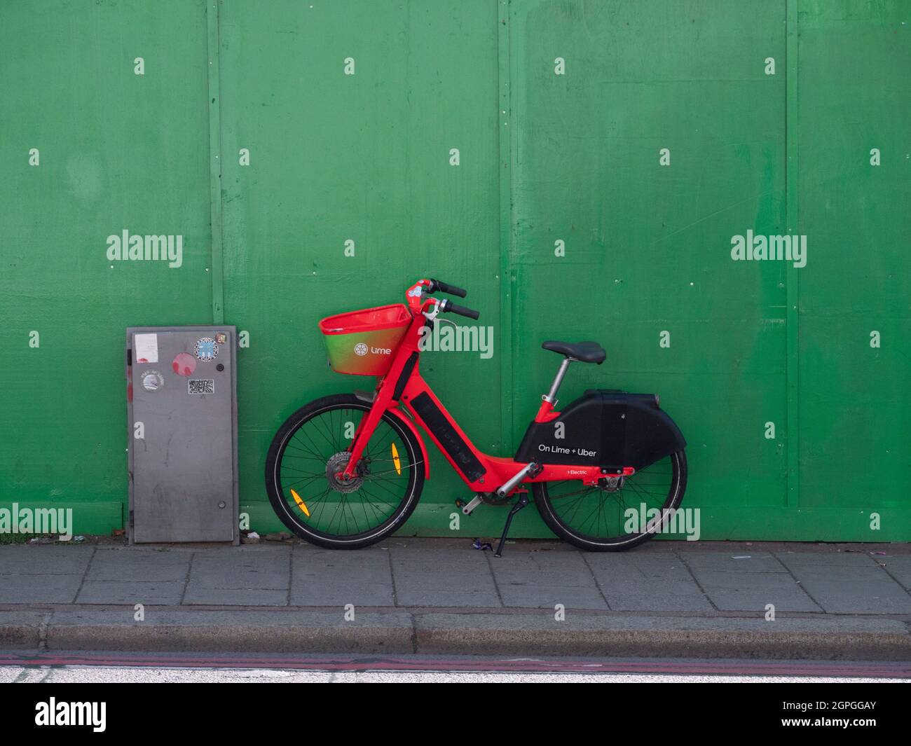 On Lime + uber branded Lime Rental bike in Battersea London, parked ...