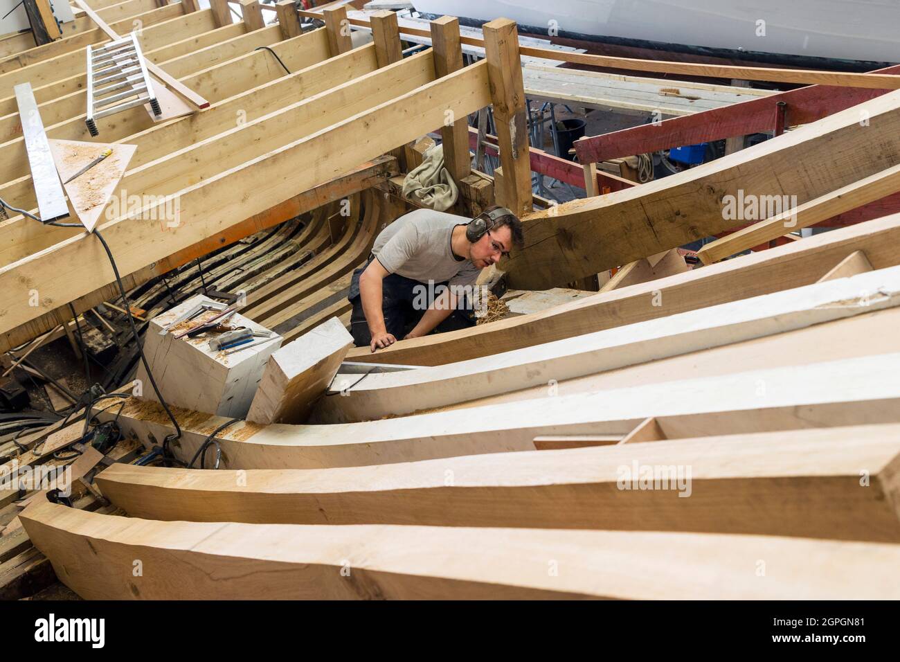 France, Finistere, Brest, Guip Shipyard, a marine carpenter working on ...