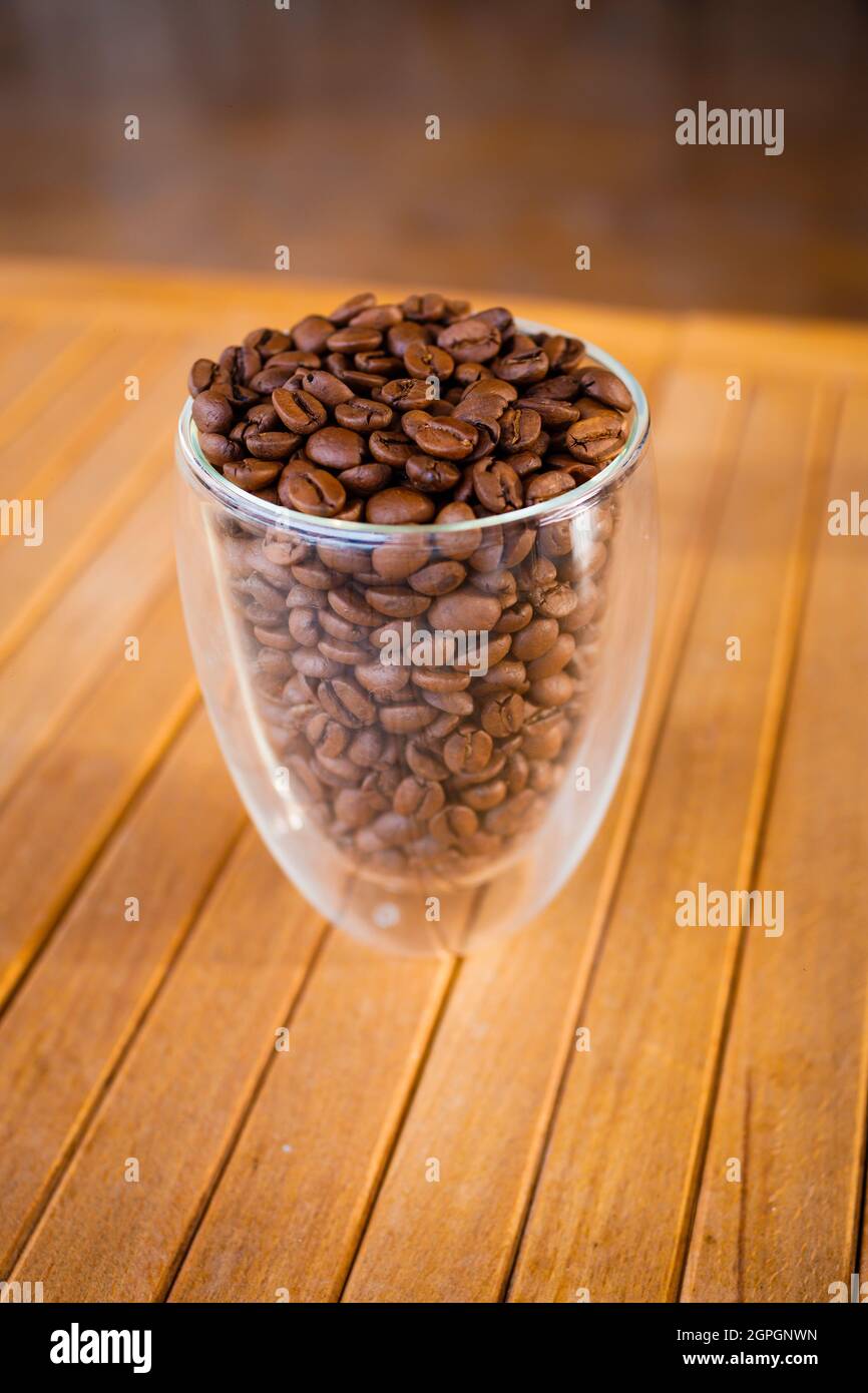 Coffee beans in a transparent glass glass. The smell of coffee Stock ...