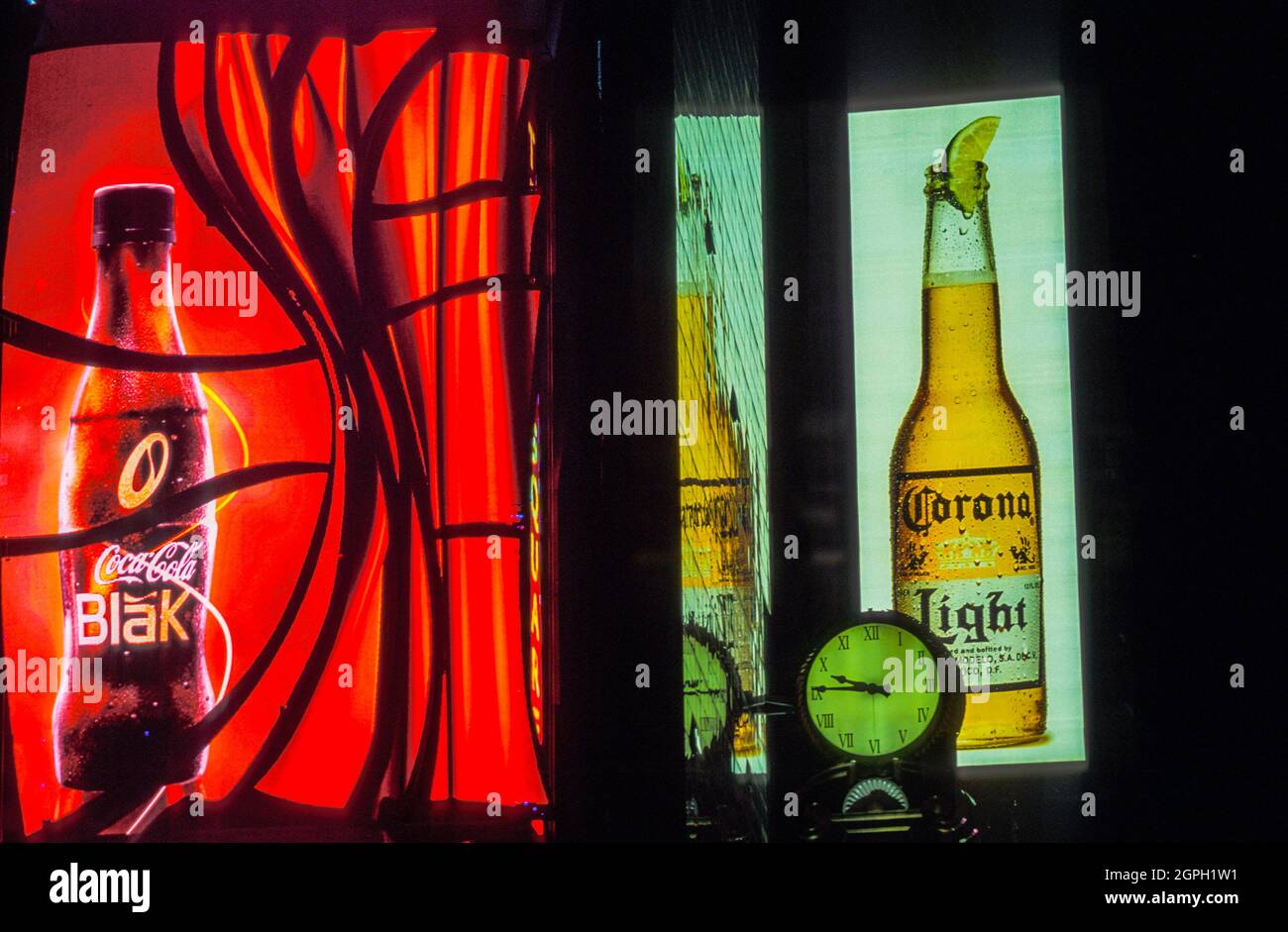 Illuminated advertisement of Coca Cola Blak and Corona Light in New ...