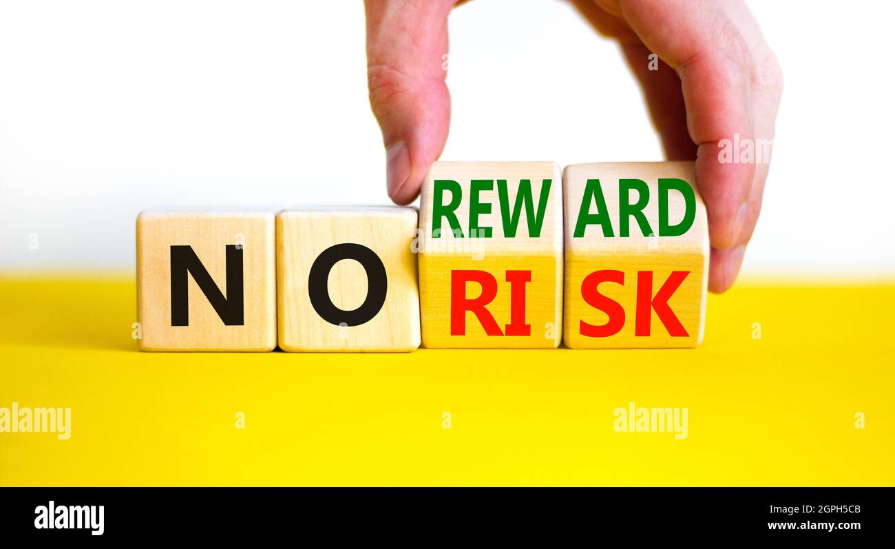 No risk or reward symbol. Businessman turns wooden cubes and changes ...