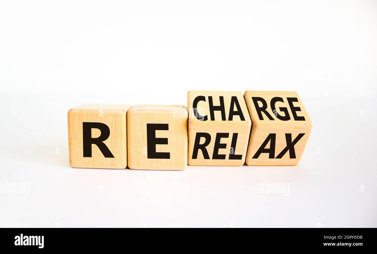 Relax and recharge symbol. Businessman turned cubes and changed the ...