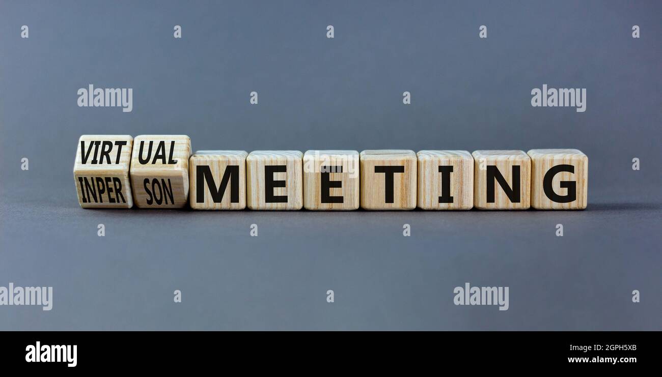 Virtual or inperson meeting symbol. Turned wooden cubes and changed ...