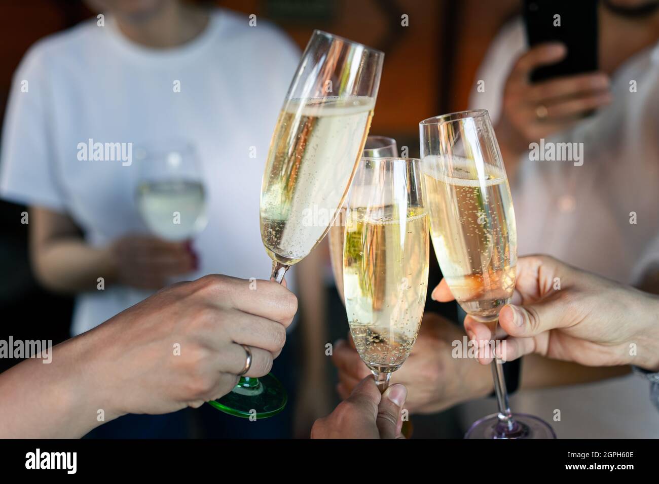 Raise the glass cheers hi-res stock photography and images - Alamy