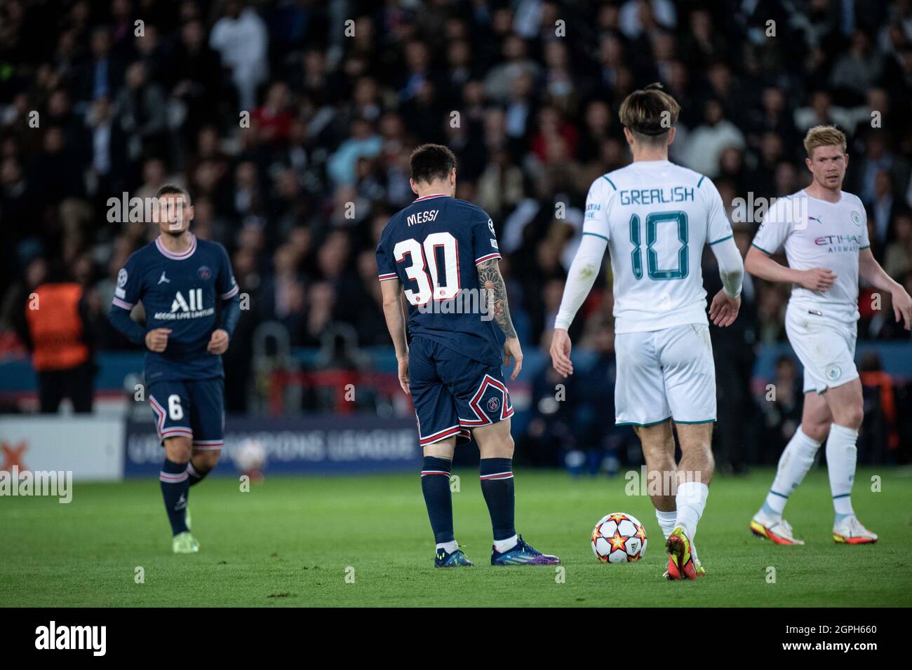 Lionel Messi of Paris Saint-Germain and Jack Grealish during the UEFA ...