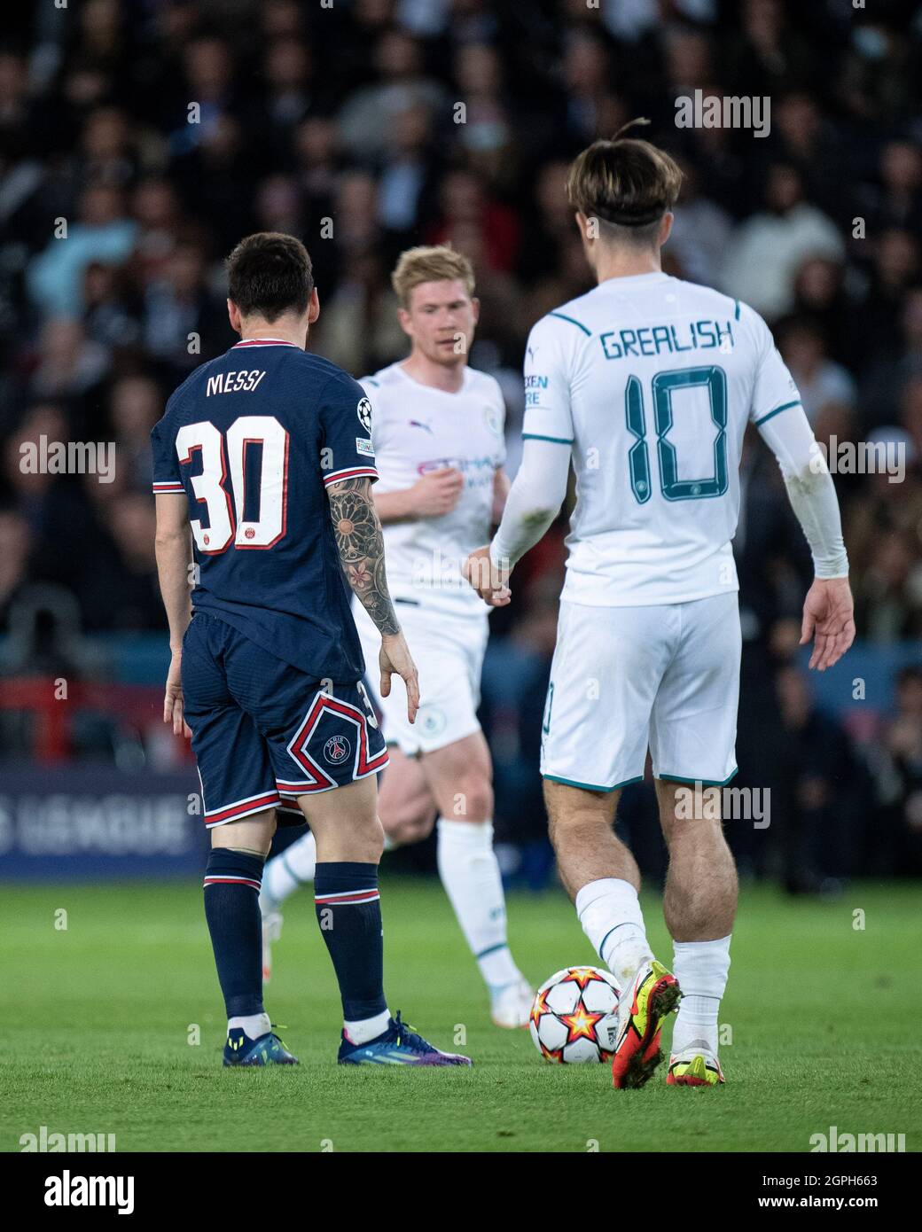 Lionel Messi of Paris Saint-Germain and Jack Grealish during the UEFA ...