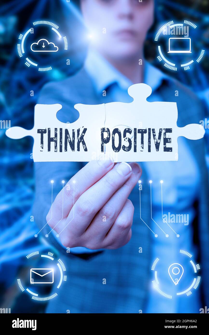 Hand writing sign Think Positive. Concept meaning The tendency to be ...