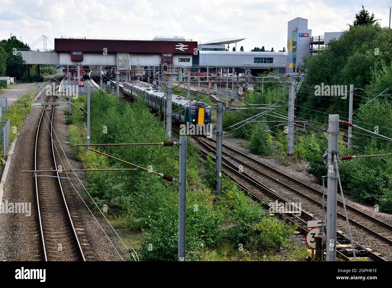 Birmingham International Train Station with short commuter train on way ...