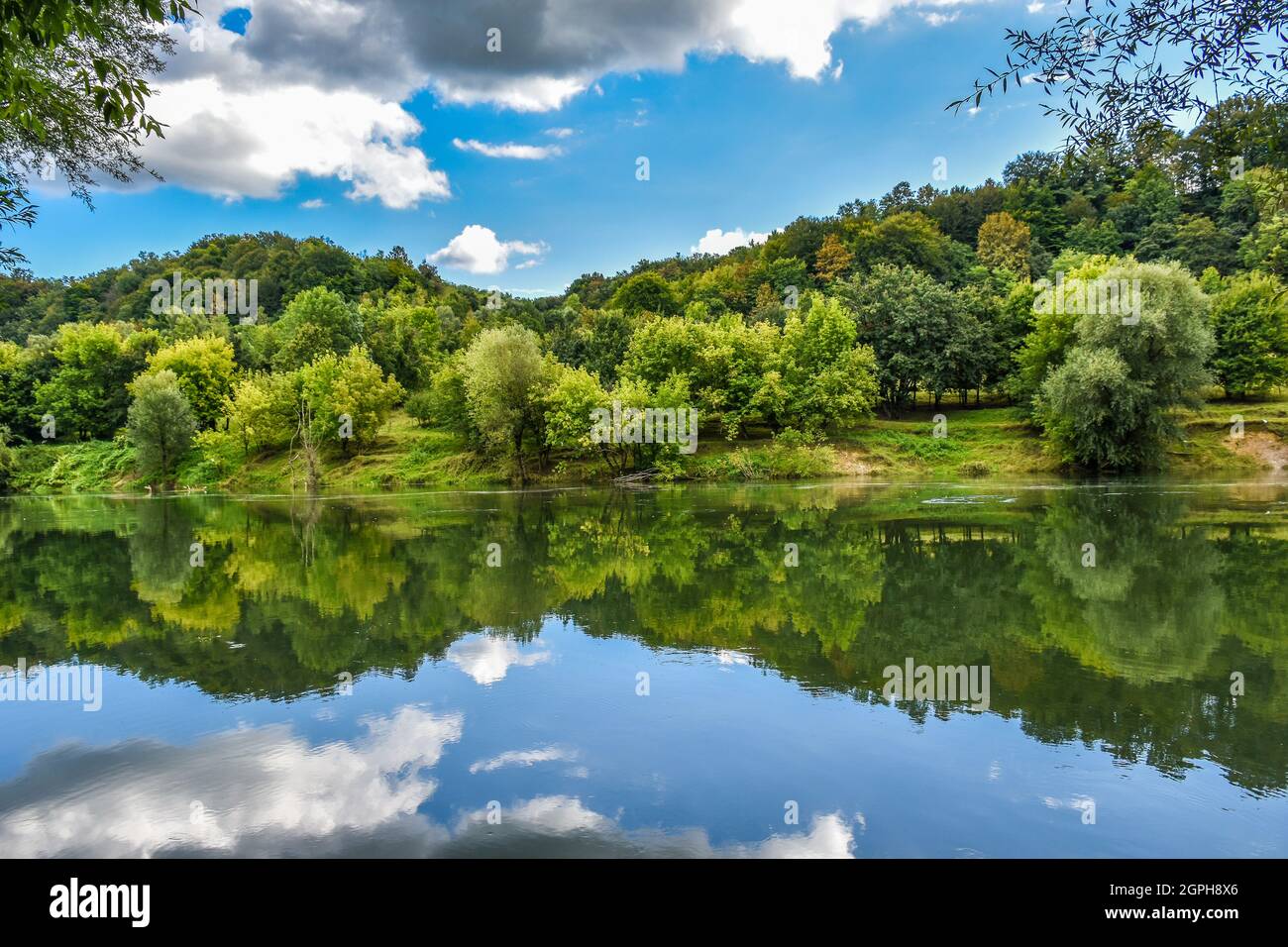 Kupa river during summer reflection on the water, Croatia Stock Photo ...