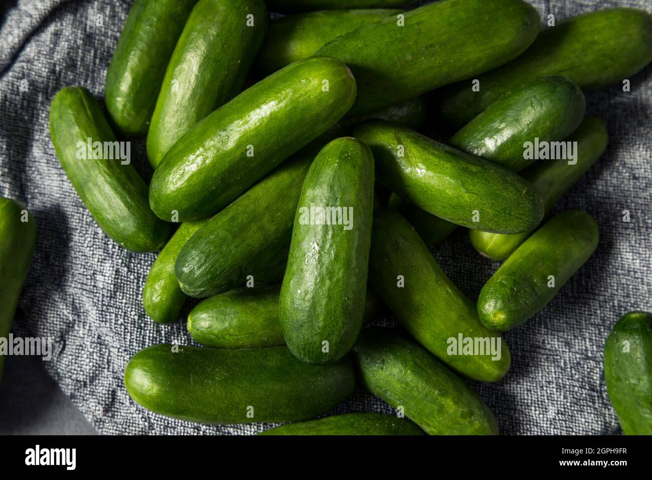 Raw Green Organic Mini Cucumbers Ready to Eat Stock Photo - Alamy