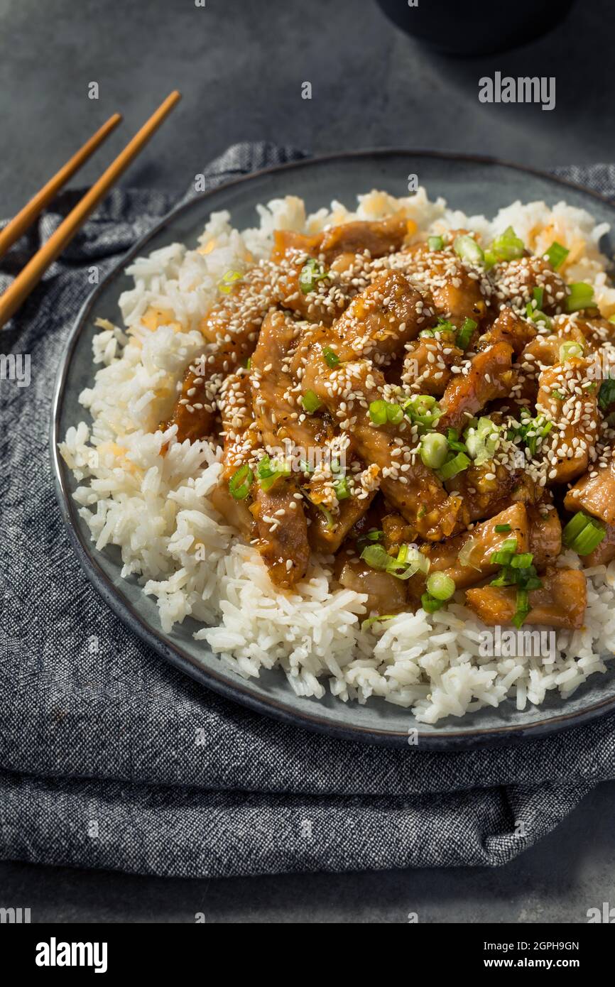 Homemade Asian Garlic Ginger Pork with Rice and Sesame Stock Photo - Alamy