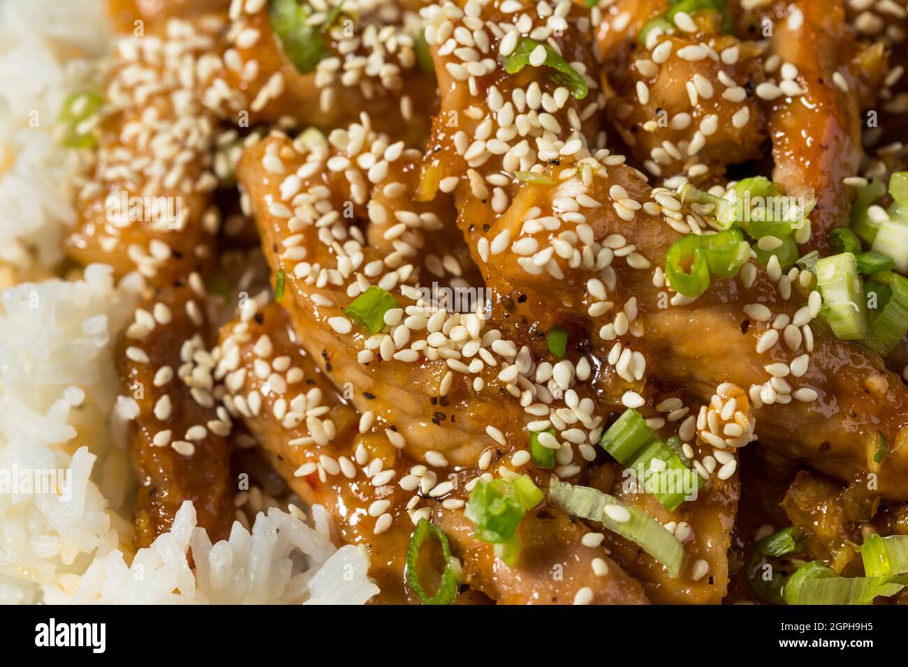 Homemade Asian Garlic Ginger Pork with Rice and Sesame Stock Photo - Alamy