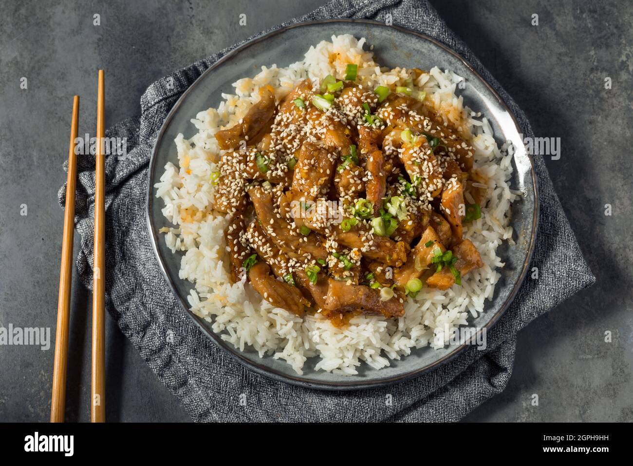 Homemade Asian Garlic Ginger Pork with Rice and Sesame Stock Photo - Alamy
