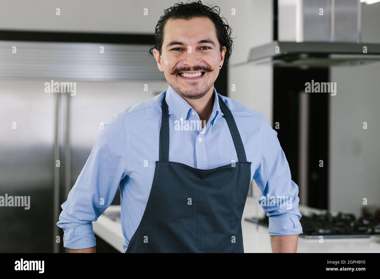 young latin man chef portrait at kitchen in Mexico Latin America Stock ...