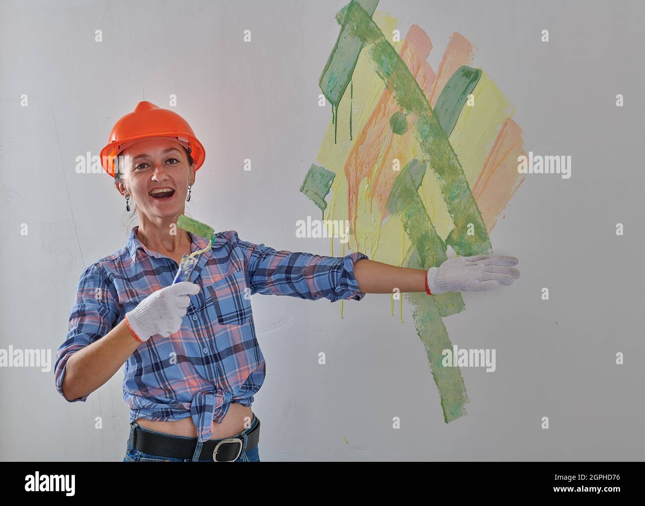 crazy foreman trying colors for the walls Stock Photo - Alamy