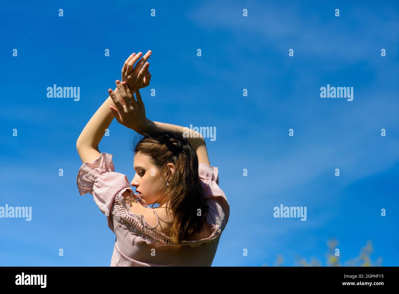 Happiness freedom concept. Woman happy smiling joyful with arms up ...